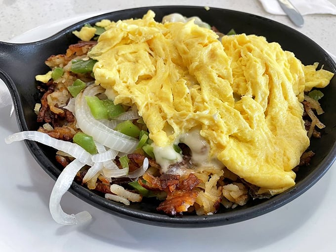 The Signature Skillet—where breakfast ingredients gather for a reunion tour that sells out every morning.