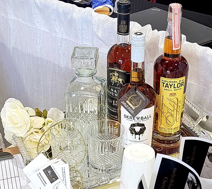 A sophisticated bar cart in the making! Vintage decanters and premium spirits await the discerning home mixologist looking to elevate their cocktail game.
