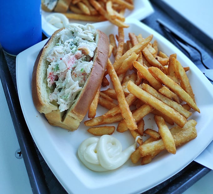 The lobster roll—where Maine tradition meets Florida freshness. This isn't just lunch; it's the reason elastic-waist shorts were invented.