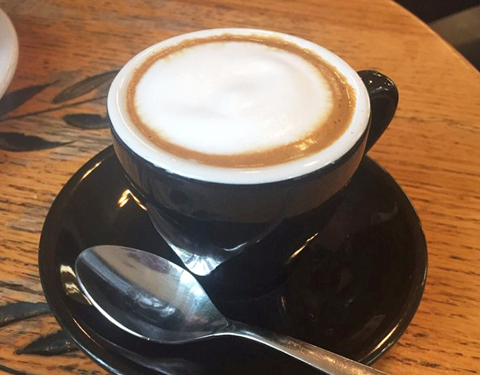 This isn't just coffee—it's a perfectly executed macchiato wearing a foam beret. The kind of cup that makes you temporarily forgive Portland for its rain.
