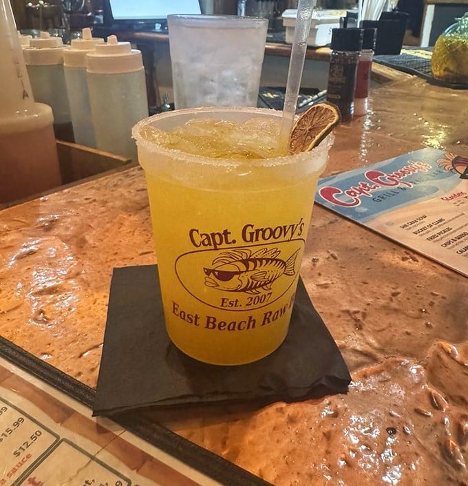 This sunshine-in-a-glass cocktail promises vacation vibes with every sip. The garnish isn't just decoration—it's a commitment to proper drinking.