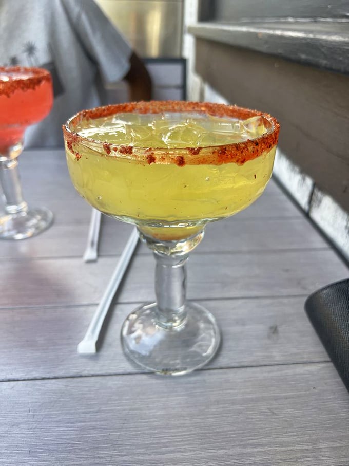 This isn't just a margarita—it's sunshine in a glass with a spicy rim that reminds you you're in California, not Kansas anymore.