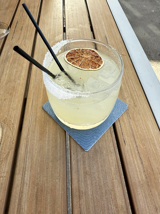 A perfectly crafted margarita with a dehydrated citrus garnish – because even sailors need a break from rum occasionally.