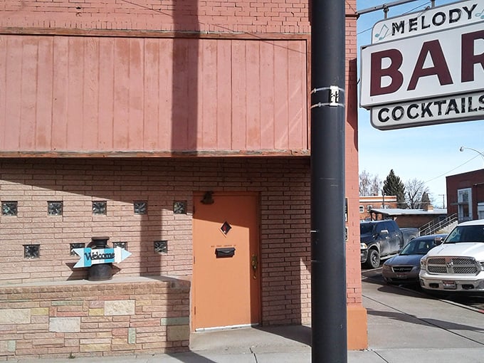 The Melody Bar's vintage neon sign promises cocktails and conversation in equal measure – some stories told here have aged as well as the spirits behind the bar.