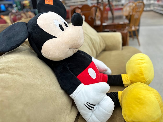 Mickey takes a breather between homes, proving that even Disney icons need a pit stop at Value Village occasionally.