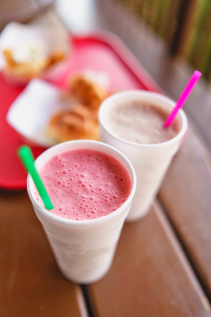 Milkshakes so thick they laugh at straws. One strawberry, one chocolate—both capable of making you postpone all afternoon plans for just one more sip.
