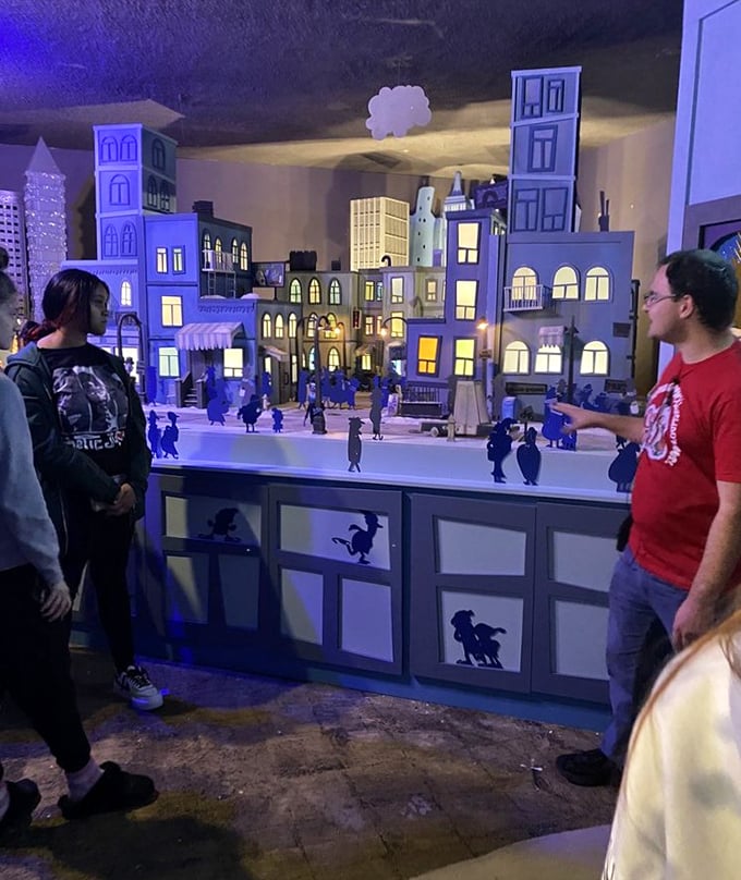 The miniature illuminated cityscape brings to mind that moment in "Home Alone" when Kevin realizes Christmas magic is real—just without the screaming and aftershave.