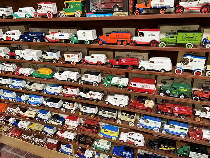 Miniature delivery trucks lined up like a parade through commercial history. Nostalgia in die-cast form, waiting for collectors or imaginative kids.
