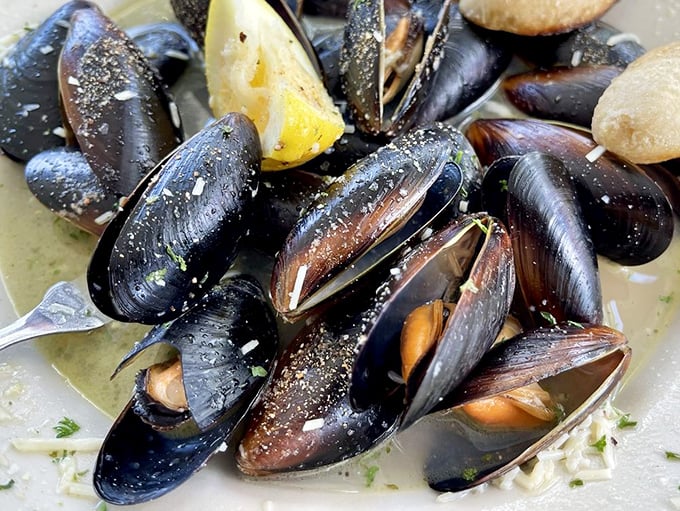 These mussels aren't just opened, they're having a full-blown conversation with that broth. Listen closely and you'll hear them singing.