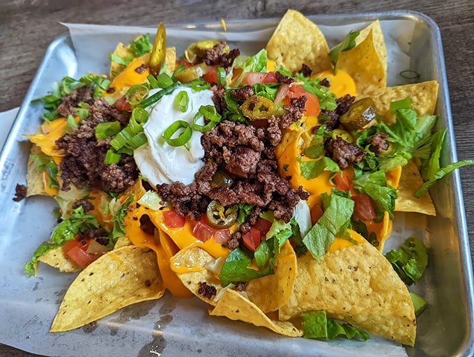 Nachos that don't skimp on the good stuff. Every chip is a treasure hunt for toppings in this mountain of melted cheese glory.