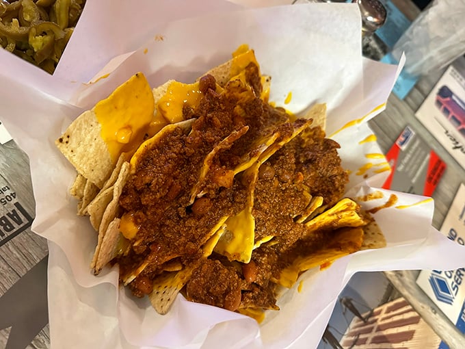 Nachos that understand the critical cheese-to-chip ratio. No architectural food towers here – just honest, melty goodness that demands to be shared.