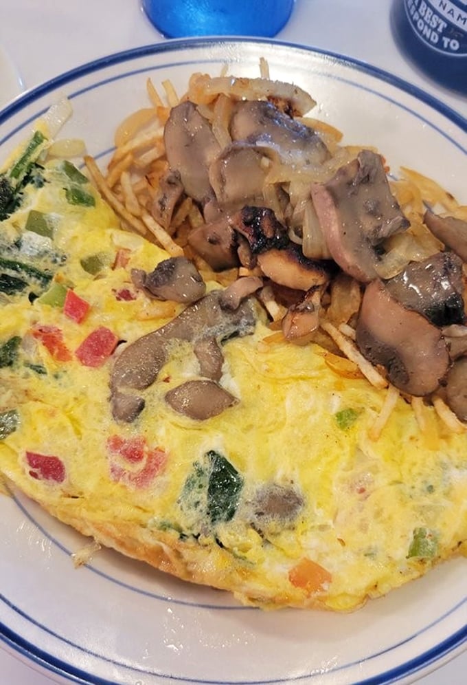 This isn't just an omelet – it's a vegetable garden wrapped in eggs with mushrooms and home fries that could convert a devoted cereal eater.