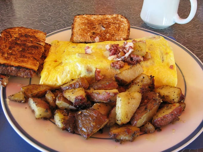 The Western omelet and home fries combo—proof that simplicity, when done right, beats complexity every time. Breakfast as it was meant to be.