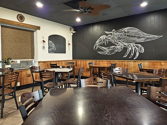 Coastal dining with artistic flair – that crab illustration isn't just decoration, it's practically a menu recommendation written on the wall.