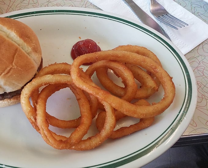 Onion rings with the perfect crunch-to-give ratio—the supporting actor that sometimes steals the whole show.