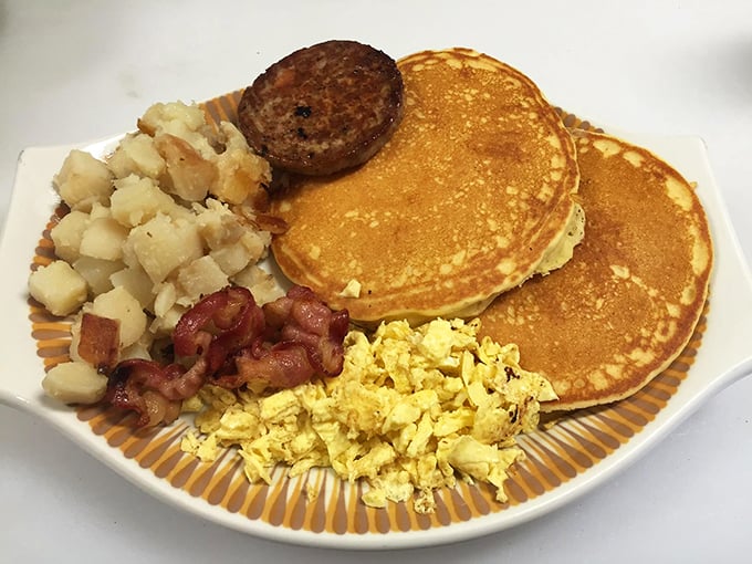Breakfast of champions or hangover cure? Those golden pancakes don't judge—they just deliver comfort one fluffy bite at a time.