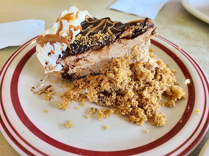 This isn't just pie—it's a peanut butter masterpiece that makes you question why anyone would waste calories on lesser desserts.
