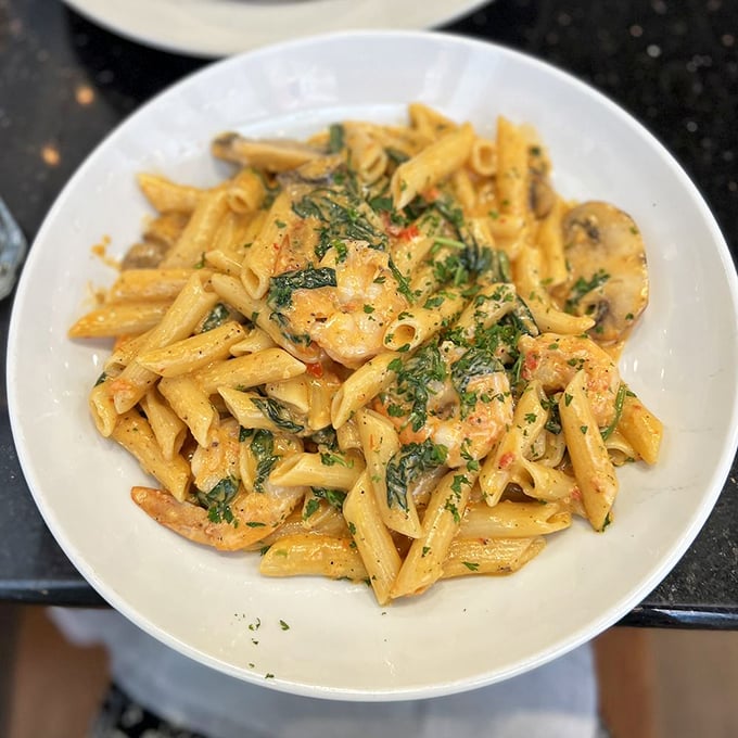 Pasta Corleone makes you an offer you can't refuse: sausage, spinach, and penne in a vodka sauce that means business.