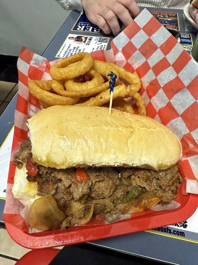 A proper Pittsburgh sandwich requires two hands, napkins on standby, and the willingness to temporarily abandon conversation.