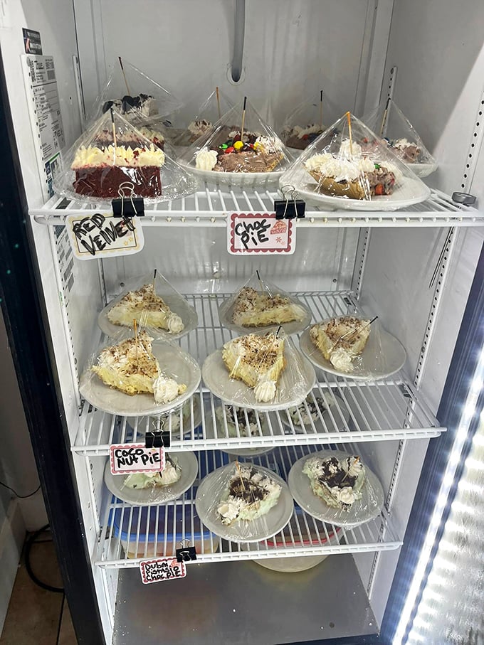 The dessert case—where willpower goes to die. These homemade pies aren't just served; they're presented as evidence that calories don't count on vacation.