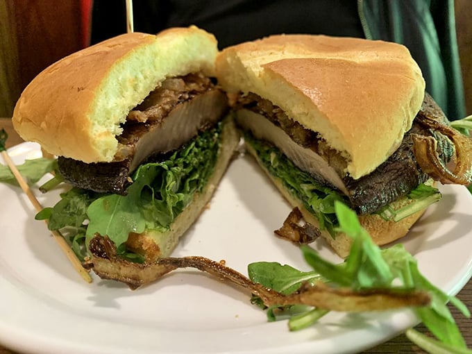 The Portobello sandwich proves vegetarian options needn't be punishment – earthy mushrooms and fresh greens create a meatless masterpiece.