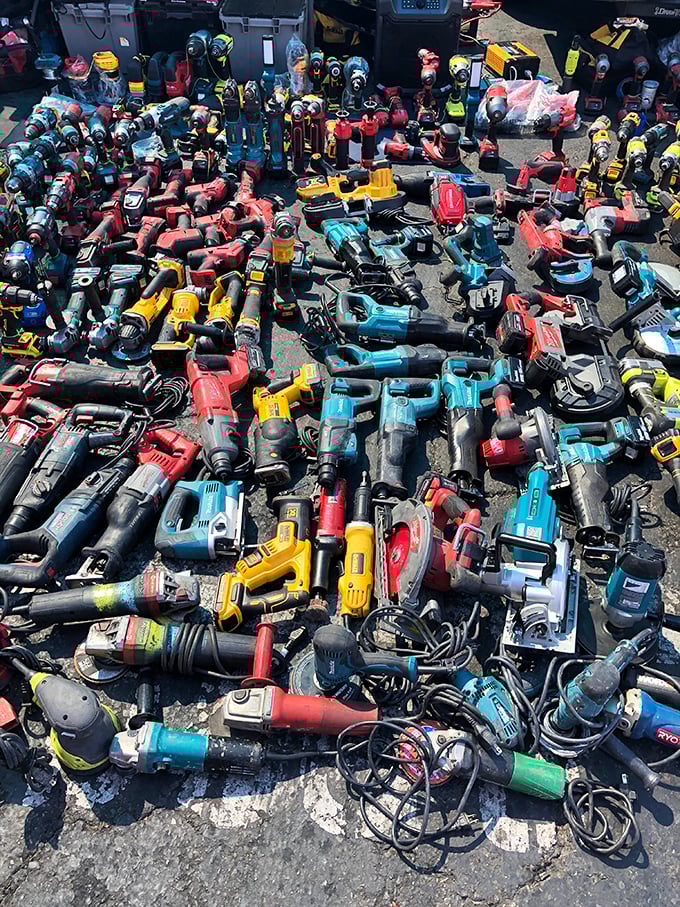 The power tool graveyard, where retired drills and sanders await resurrection in the hands of DIY enthusiasts and budget-conscious contractors.