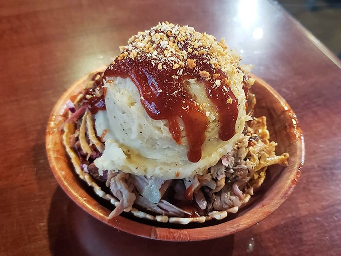 The pulled pork sundae—meat's answer to the ice cream parlor. Mashed potatoes replace vanilla, BBQ sauce trumps chocolate syrup.