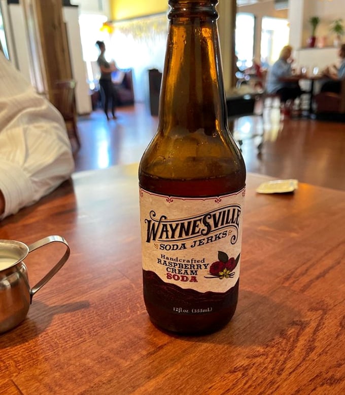 A Waynesville Raspberry Cream Soda stands ready to cut through richness—the breakfast equivalent of a palate-cleansing intermission.