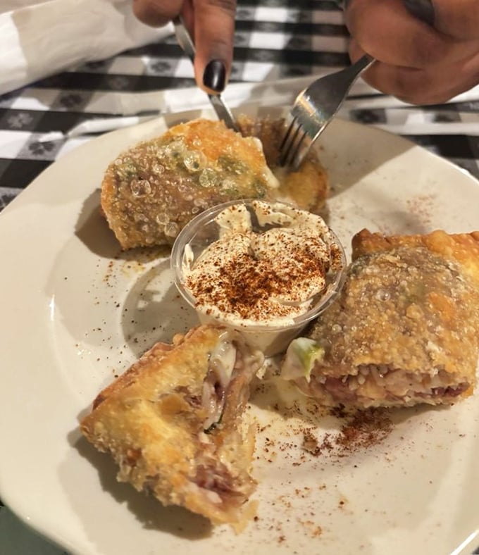 Savory, golden-fried perfection with a side of something creamy. This is the kind of dish that inspires poetry – or at least very enthusiastic mumbling.