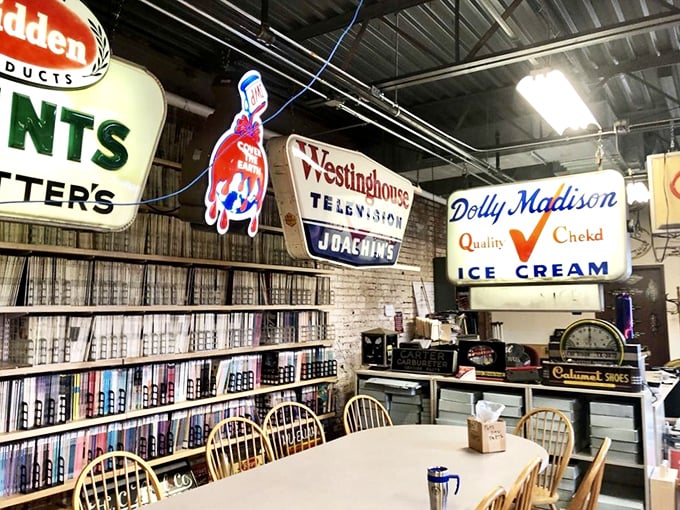 Westinghouse, Dolly Madison, and other vintage brands hover above a research library—academia meets Americana in perfect harmony.