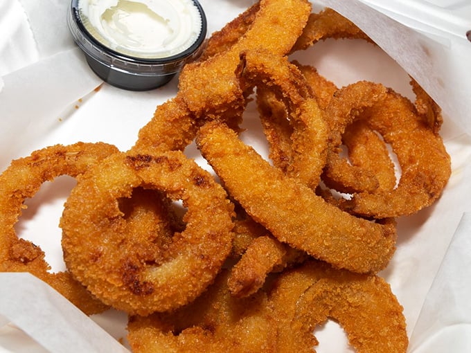 Even the onion rings deserve their moment of glory—perfectly breaded circles of sweetness that crunch loud enough for neighboring tables to notice.