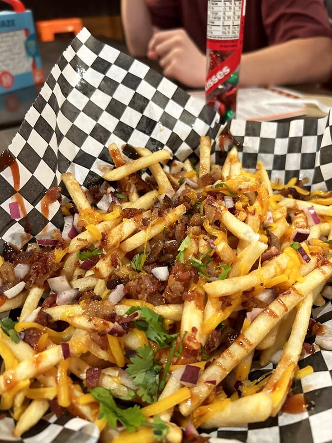 These loaded fries are what would happen if a chili cheese dog and French fries had a beautiful baby—topped with meat, cheese, onions, and herbs for maximum flavor impact.