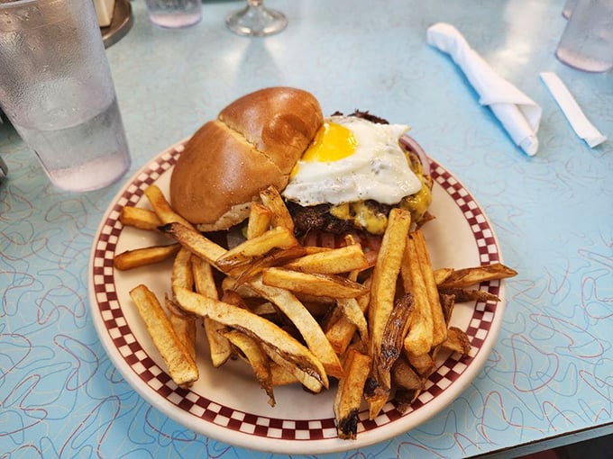 The burger that answers the eternal question: "Can breakfast and lunch live together in harmony?" Yes, with a fried egg as peacekeeper.