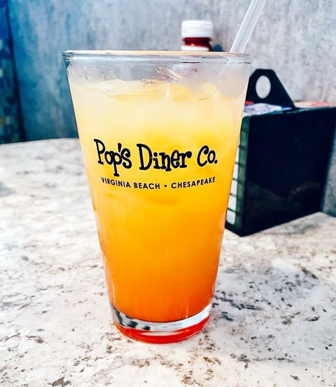 That gradient in the glass isn't just pretty—it's a sunrise in liquid form. Pop's knows that sometimes breakfast needs a splash of color.