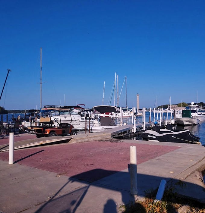 Marina life at its finest—where boats gently bob in their slips and golf carts patiently wait for their next island adventure.