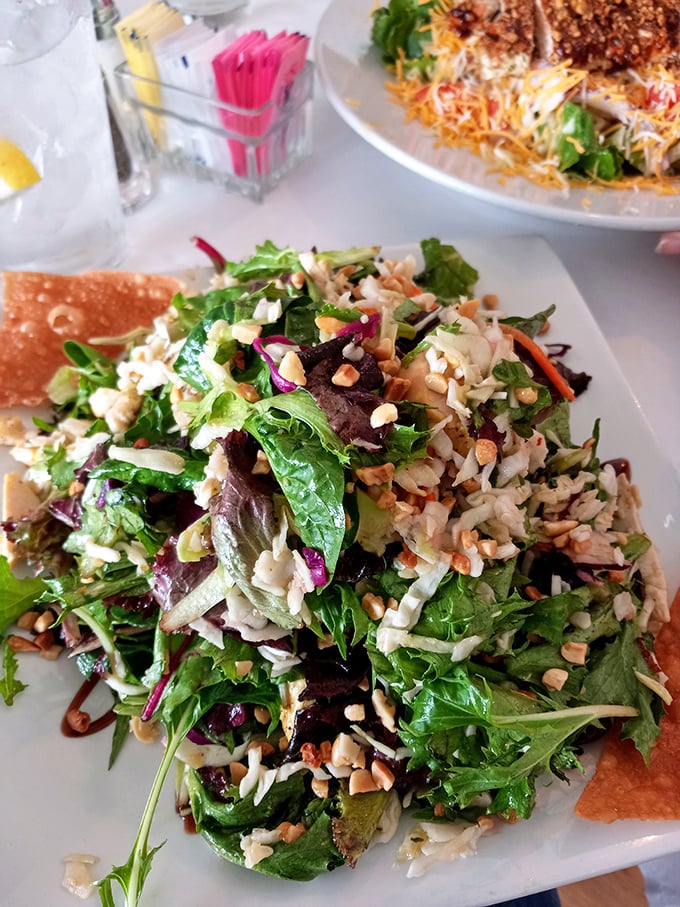 A salad that actually excites—crisp greens, crunchy nuts, and enough interesting bits to make you forget you're eating something healthy.