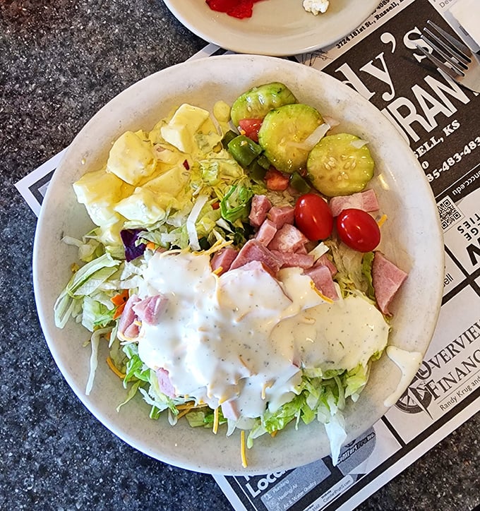 A chef's salad that proves vegetables can be more than an obligation—they can be a canvas for ham, cheese, and creamy dressing.