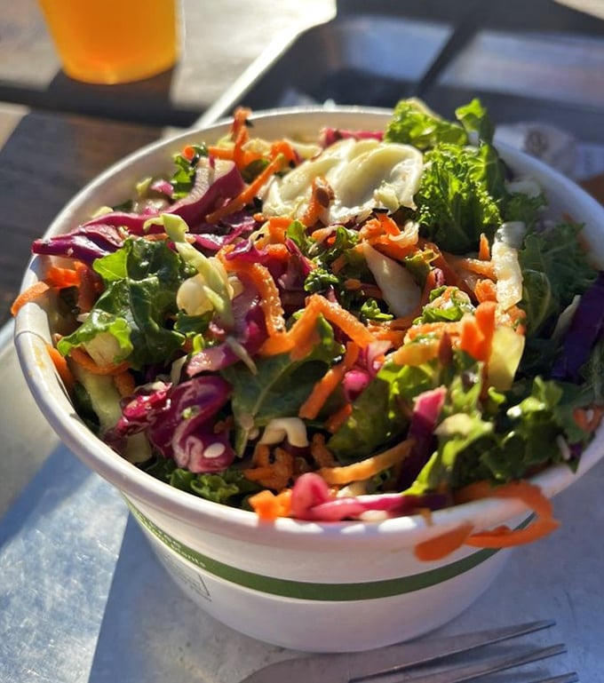 A vibrant slaw that proves vegetables deserve respect too – the perfect palate cleanser between bites of seafood that somehow manages to never feel like punishment.