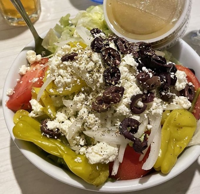 A Greek salad that proves vegetables can party too—especially when feta cheese and kalamata olives crash the festivities.