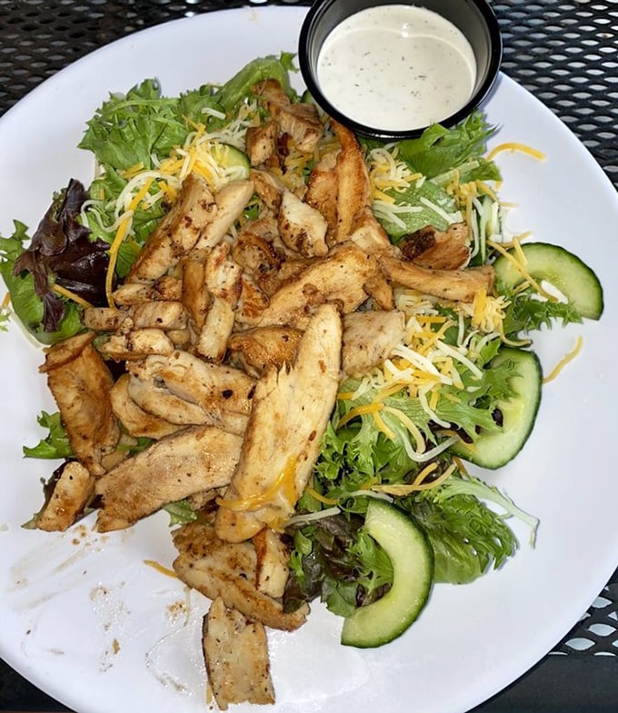 This isn't just a chicken salad—it's a protein-packed garden party where grilled chicken mingles with fresh veggies and a creamy dressing plays host.