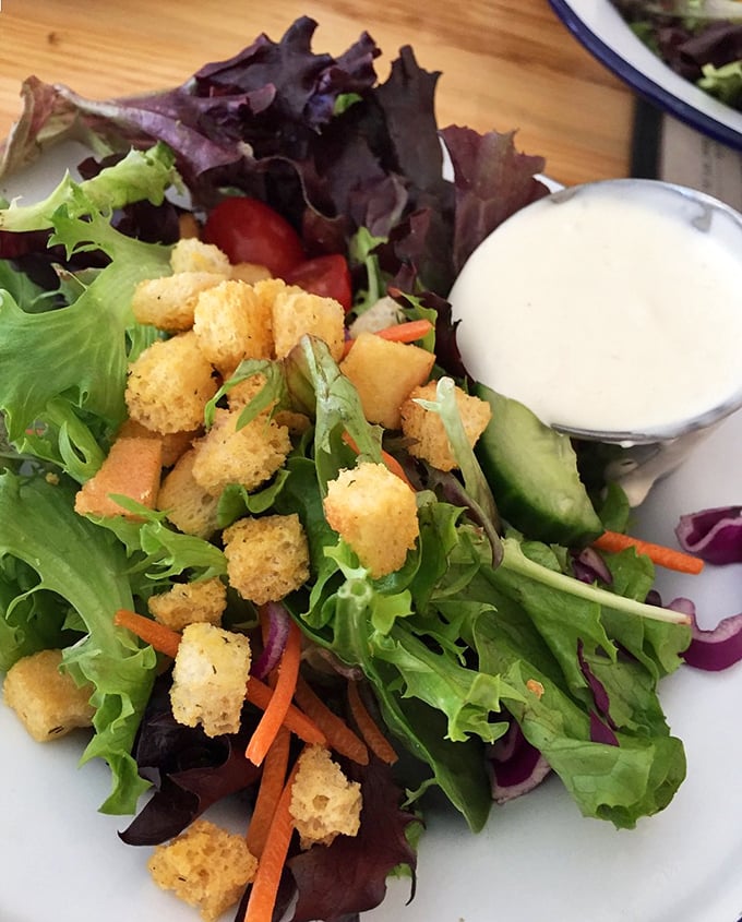 A salad that doesn't apologize for being healthy. Those golden croutons are like little flavor lifeboats in a sea of fresh greens.
