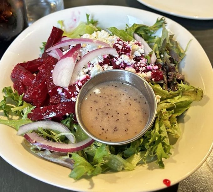 A beet and goat cheese salad that proves vegetables can be the main character—roasted ruby gems playing perfectly against tangy cheese.
