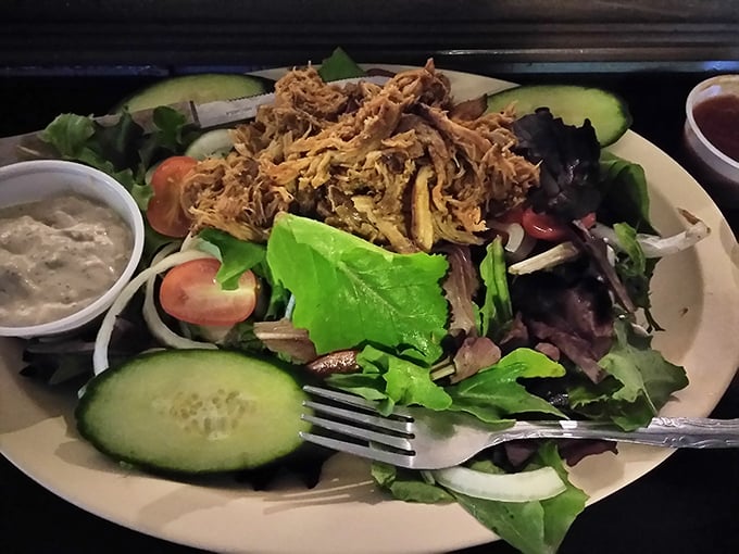 Even the salad gets the barbecue treatment, with pulled meat taking center stage among the greens—because vegetables need protein too.