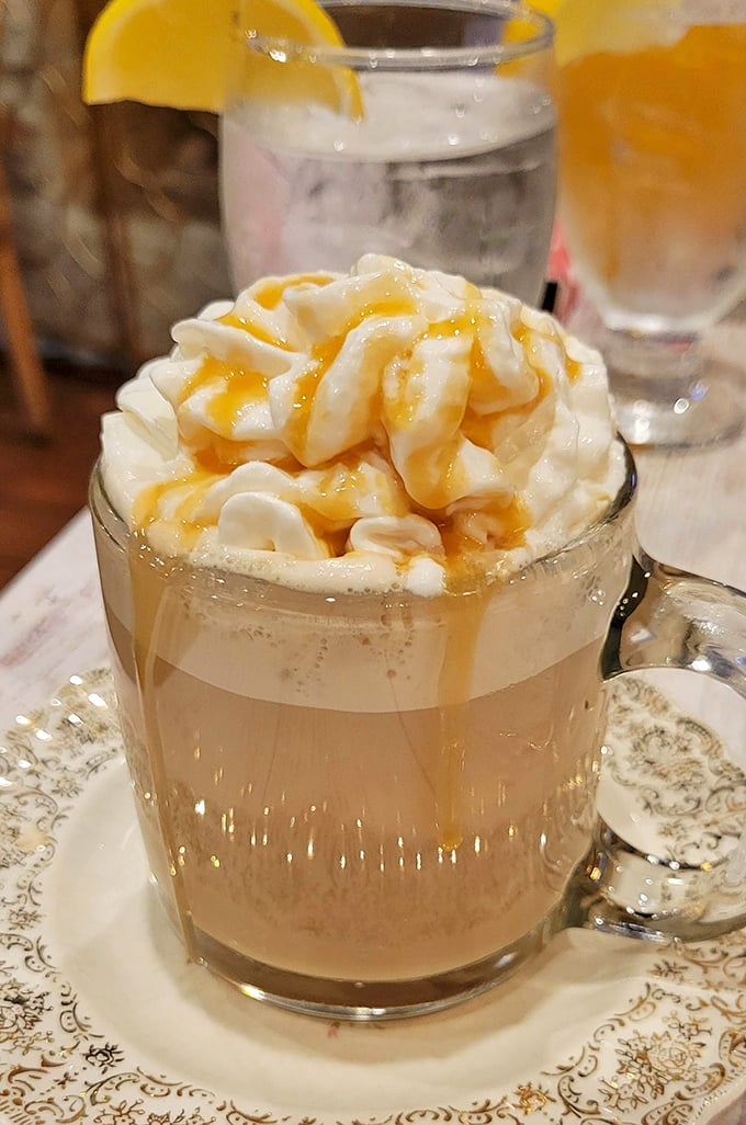 This isn't just a latte—it's a warm hug in a vintage teacup. The salted caramel topping melts into the foam like butter on hot pancakes.