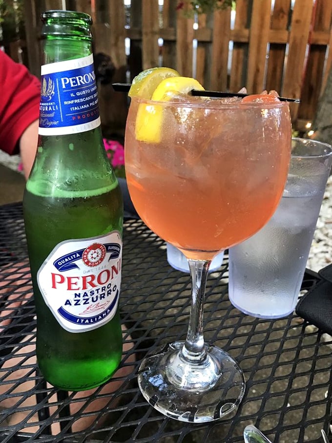 Nothing says "la dolce vita" quite like Peroni and a sunset-colored Sangria on Guarino's patio—summer in a glass.