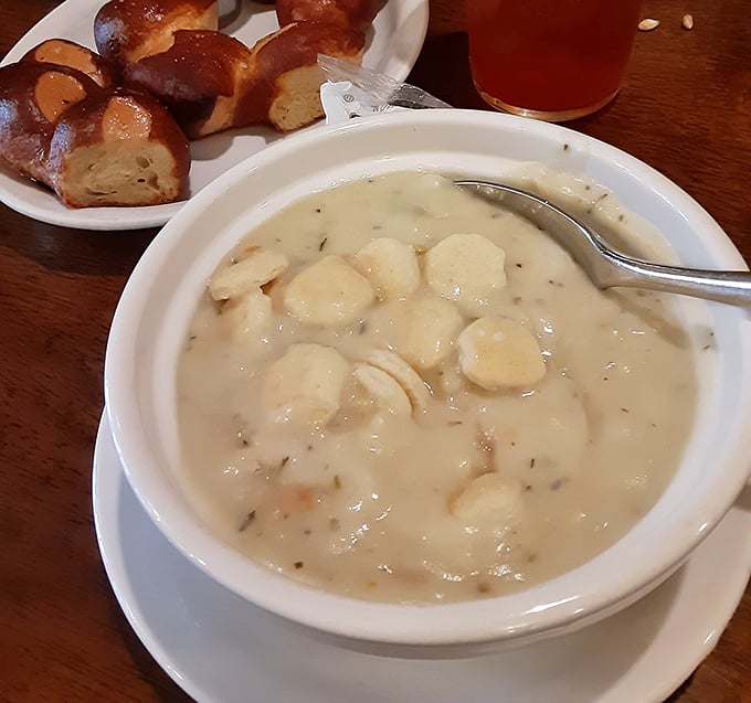 A bowl of seafood chowder so creamy and substantial it could qualify as a life raft in a storm – with pretzel rolls standing by for necessary dipping duty.