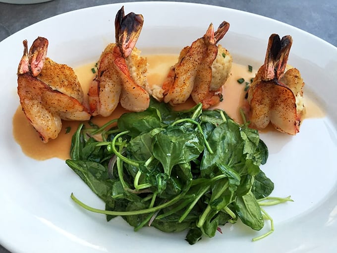 These shrimp aren't just perfectly cooked; they're performing a synchronized swimming routine through that velvety sauce.