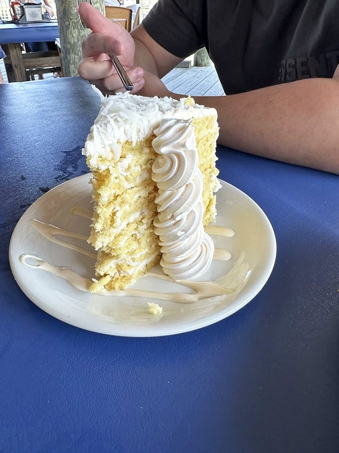 Smith Island cake towers like a delicious skyscraper, each layer whispering sweet promises that this Maryland classic absolutely delivers on.