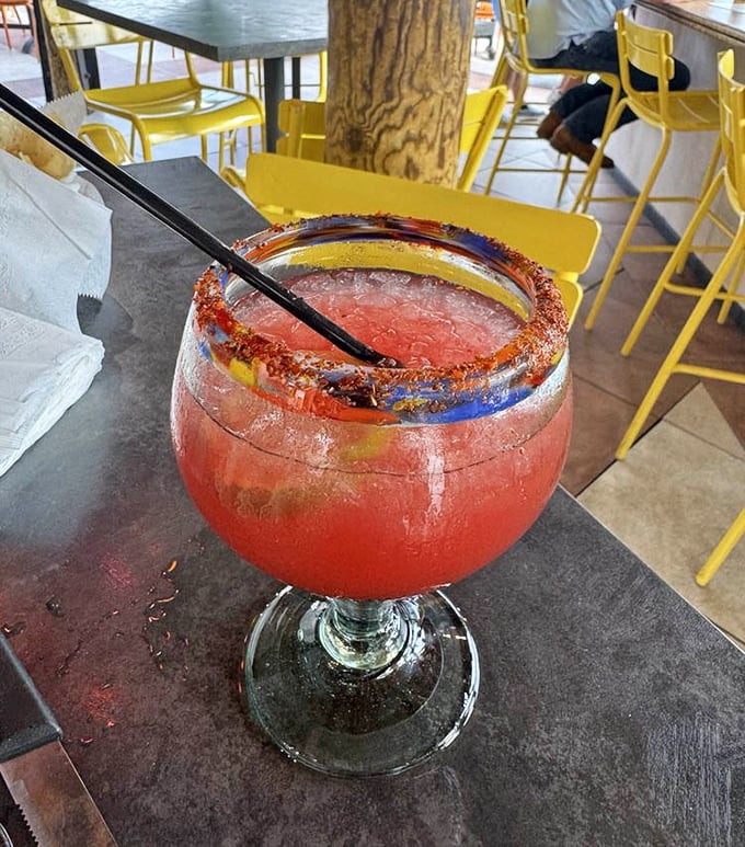 Not just a margarita—a vacation in a glass. That salt-sugar rim is the beachy equivalent of putting your toes in the sand.