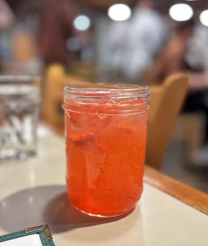 That's not a typo—it's fresh strawberry drink in a mason jar, because even your beverages deserve to feel like they're at a country fair.